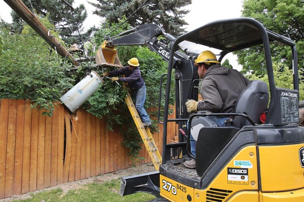 Wind Leaves Downed Trees and Damaged Equipment in Its Wake