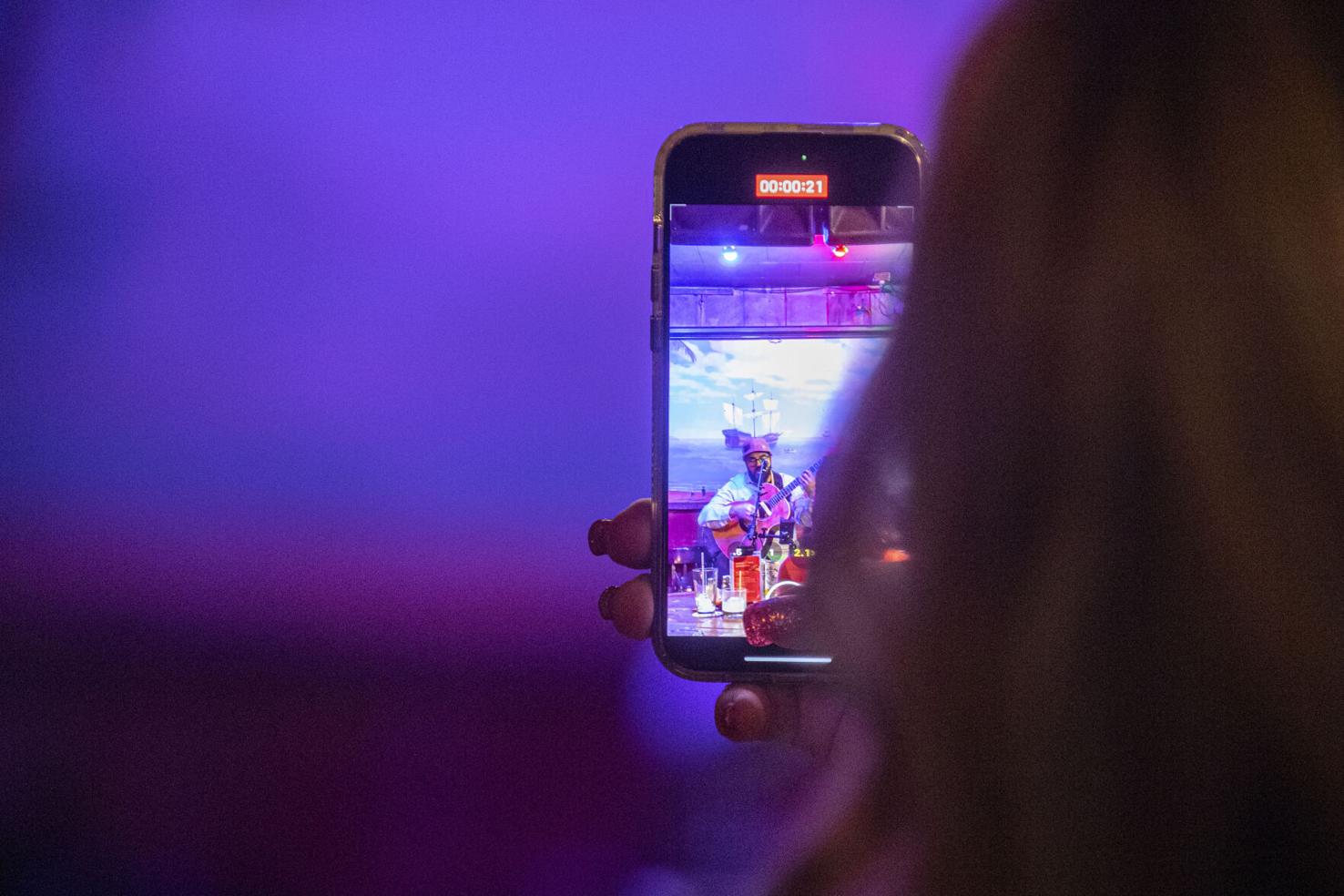 Burley-born artist Aaron Golay performs for The Cove