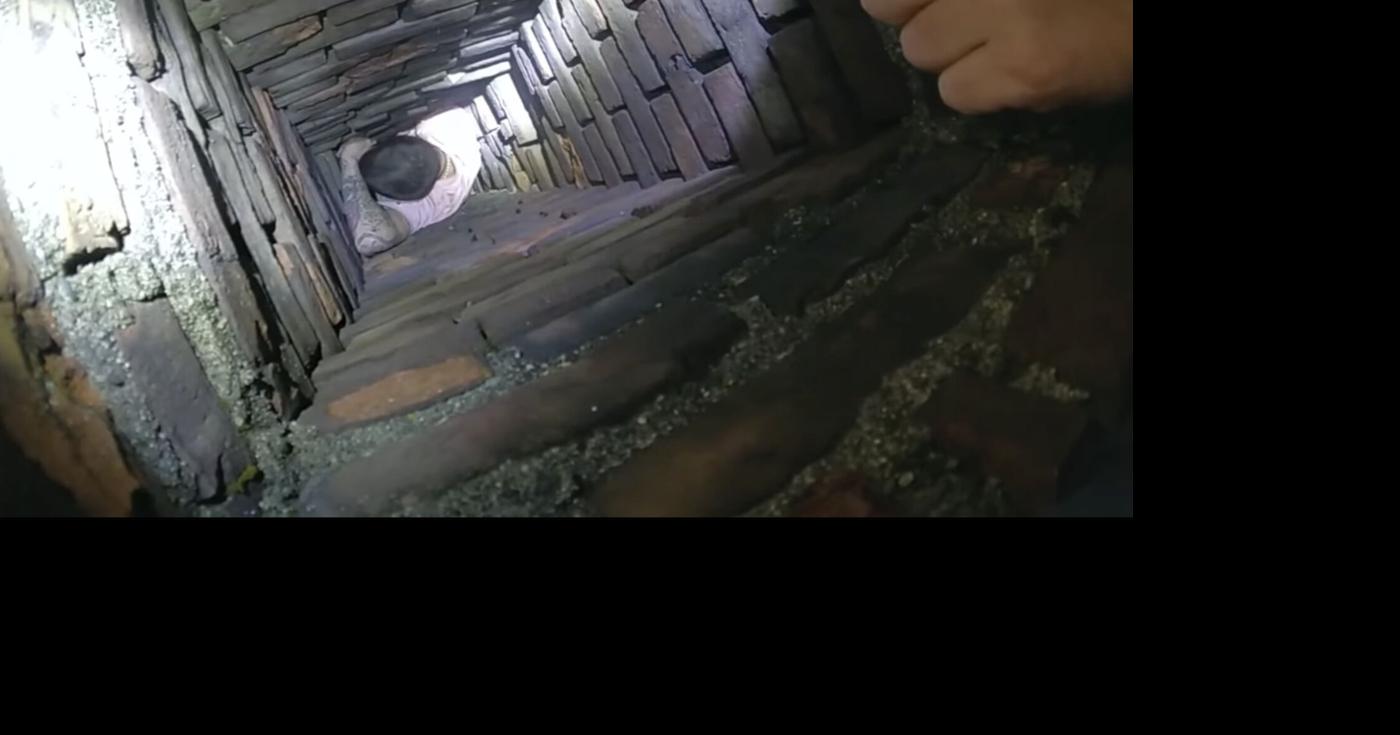 Man gets stuck in chimney while running from police