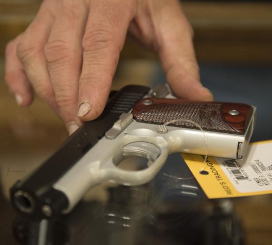 Bill to let 18-year-olds carry concealed handguns in cities signed into law