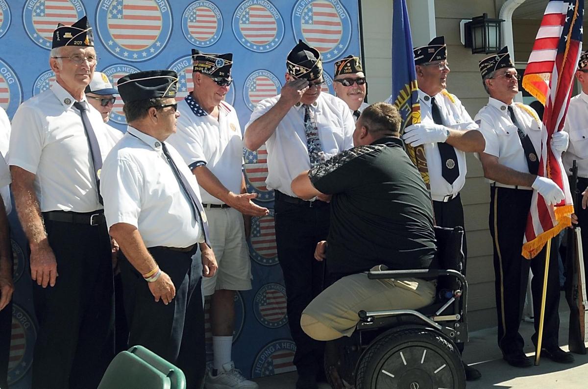 Wounded vet Jack Zimmerman formally receives lakeside home | Local News ...