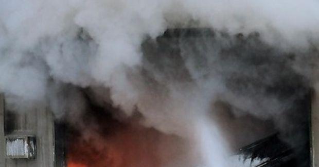 Update: Wood stove fire destroys large garage at Rasmussen residence ...