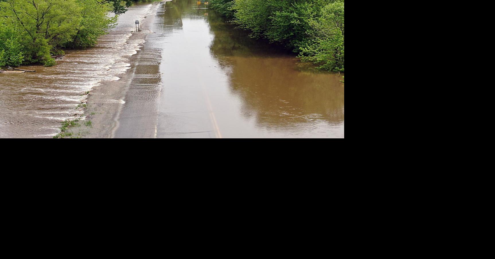 PHOTOS: Flooding closes roads, causes headaches along the Minnesota ...
