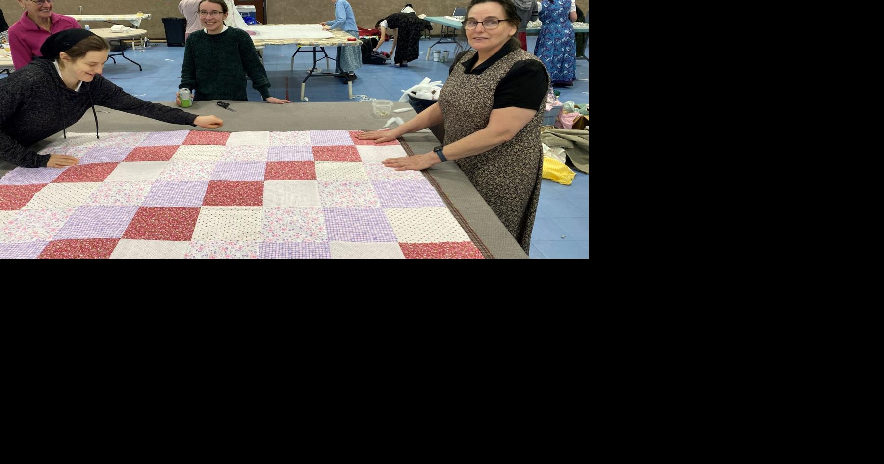 Sewing service to others; Hutterite quilting project sends hundred ...