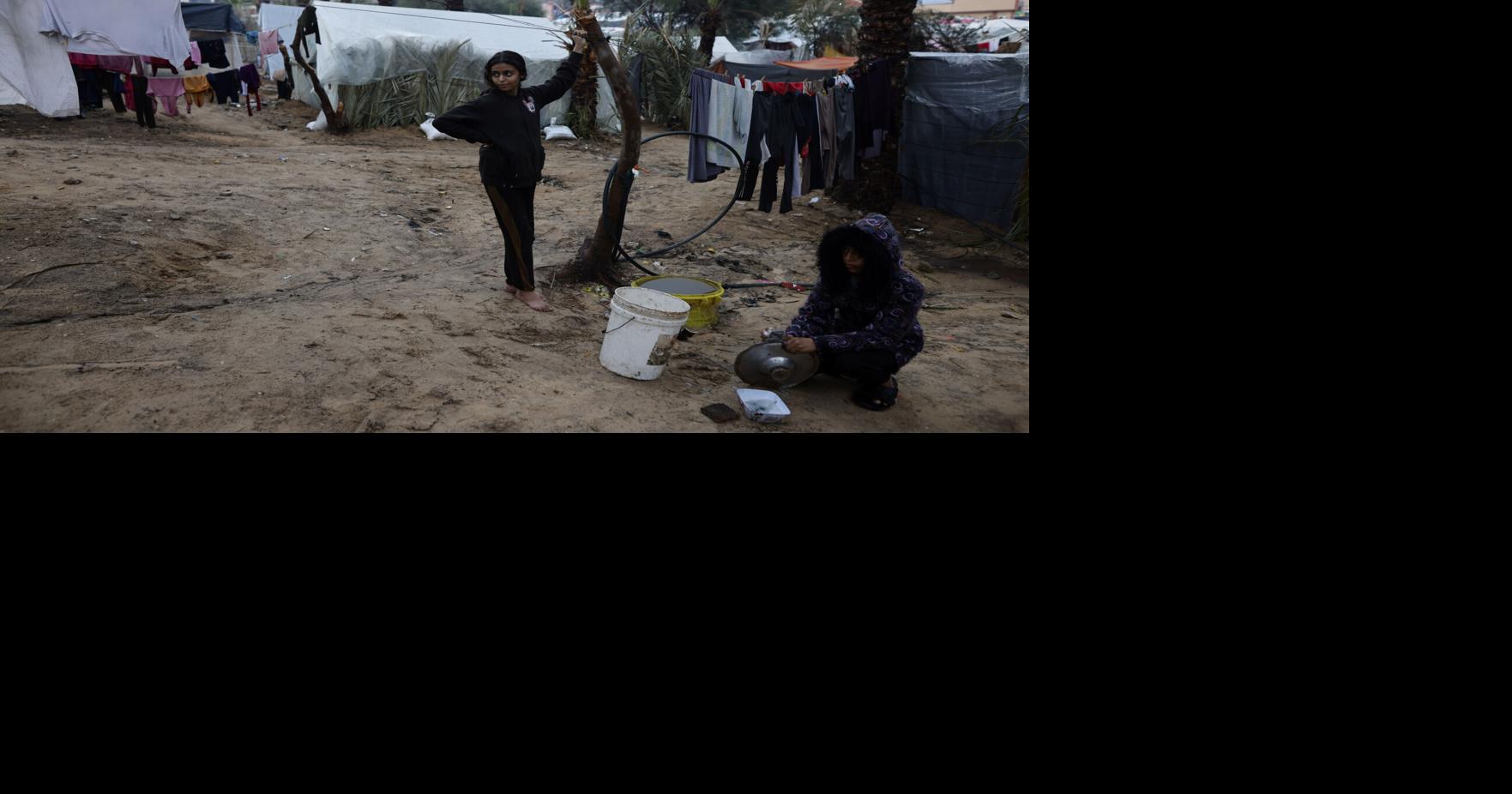 Displaced Gaza residents sheltering in tents face heavy rainfall ...