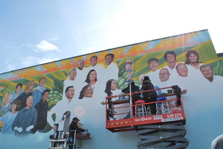 One of St. James' first immigrants returns with colorful thank you ...