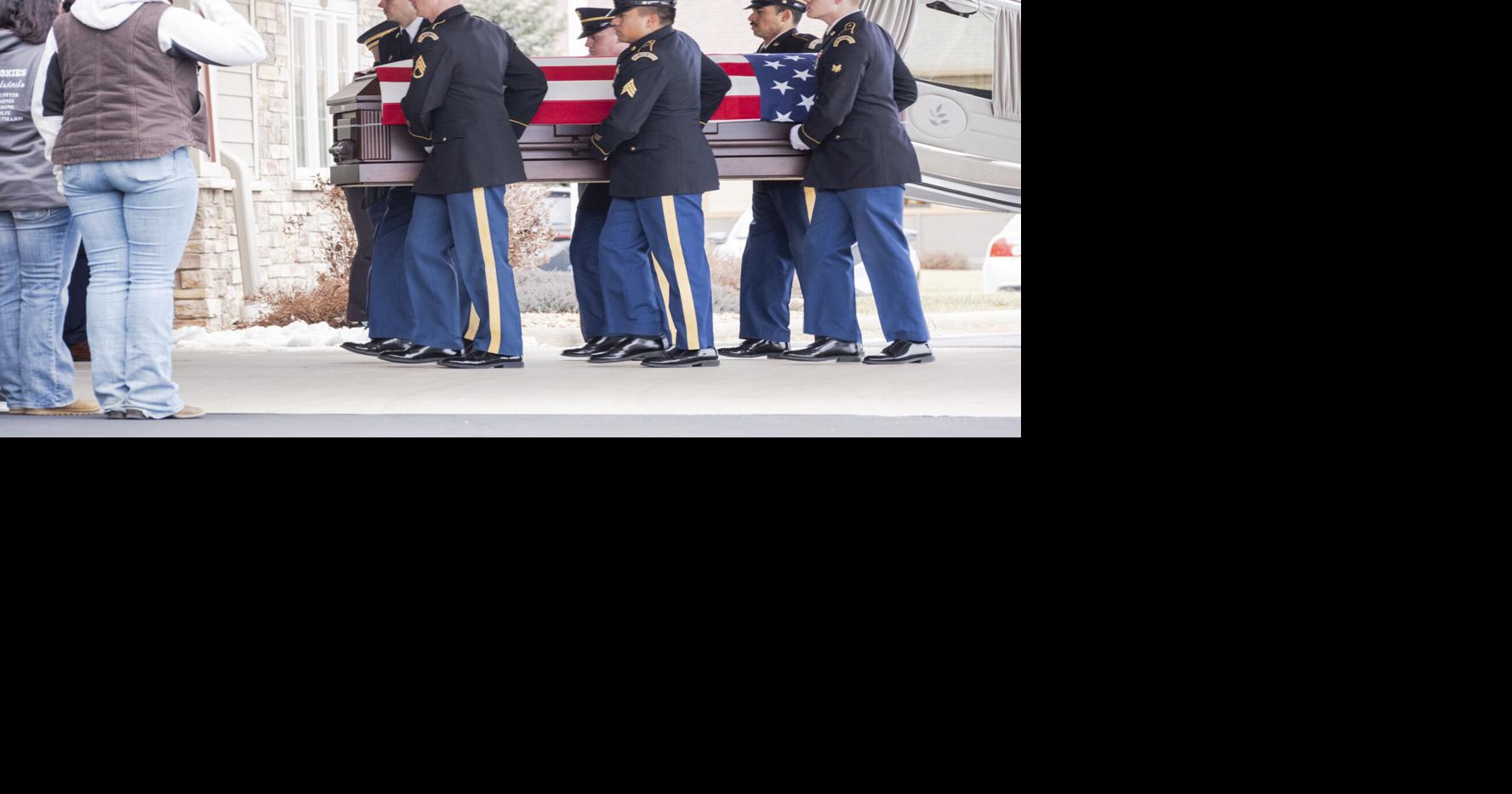 Fallen hero comes home: Sgt. Cade Wolfe saluted along processional ...