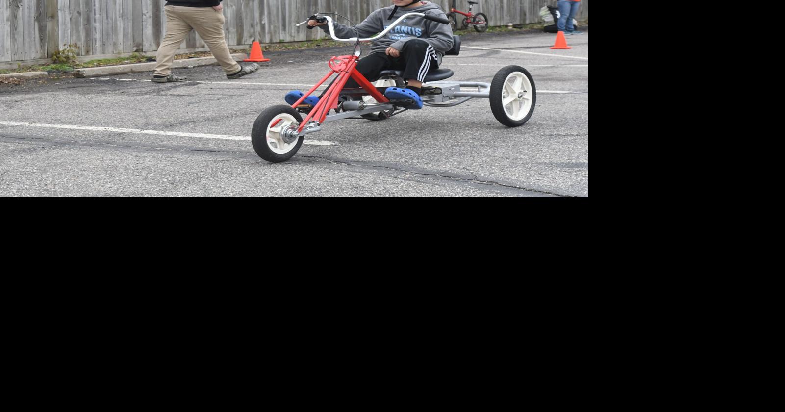 Kids get new bikes, learn safety tips at bike rodeo and Kids’ Bike Day ...