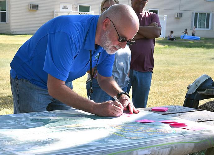 Quarry concepts show lots of housing, riverside plaza | Local News ...