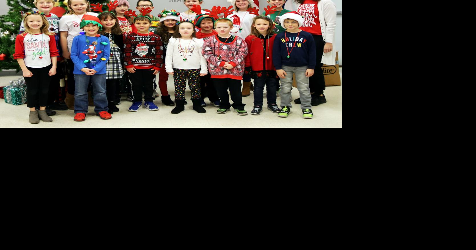 Spoofhounds caroling as a team | Schools | Maryville Forum