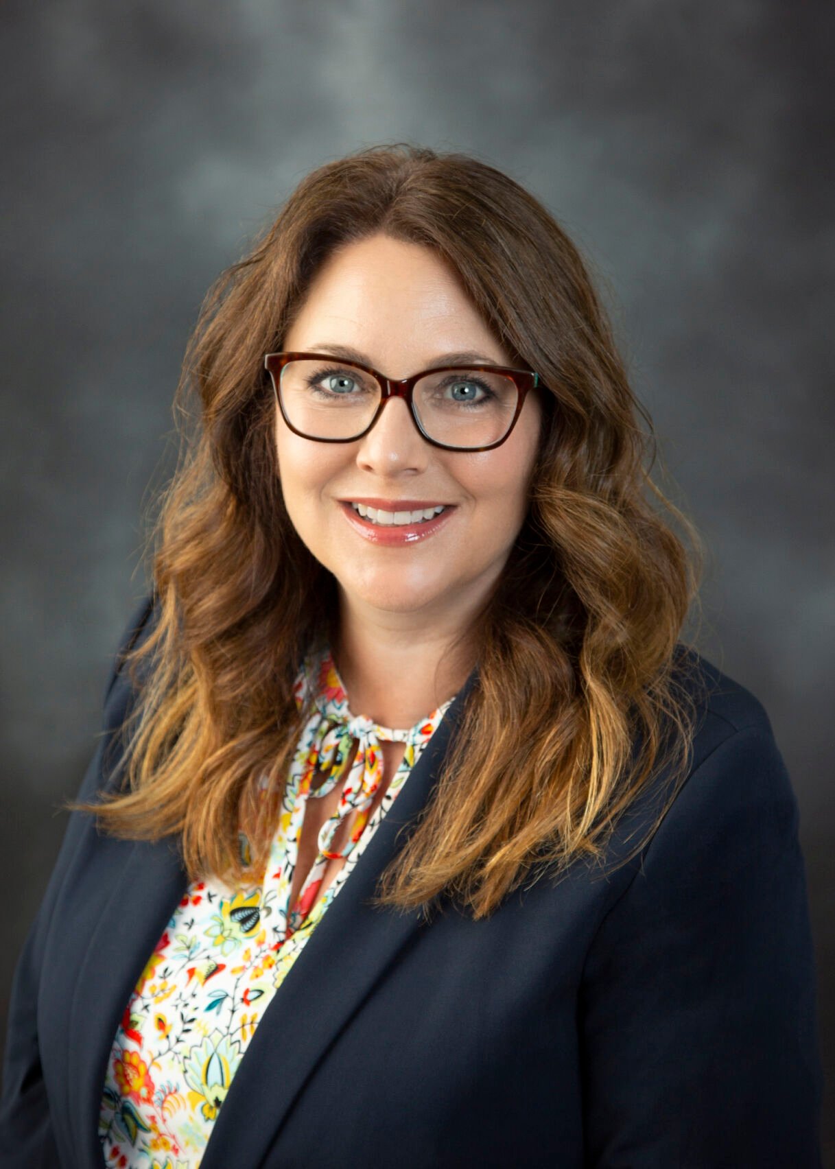 Gina Holliger, EA | In the Spotlight | mbj.com