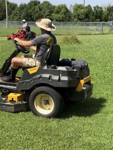 Volunteers help prepare Mike Deak track for Parkinson's Run | Local ...