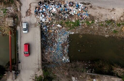 Albania's waste-choked rivers worsen deadly floods | National News ...