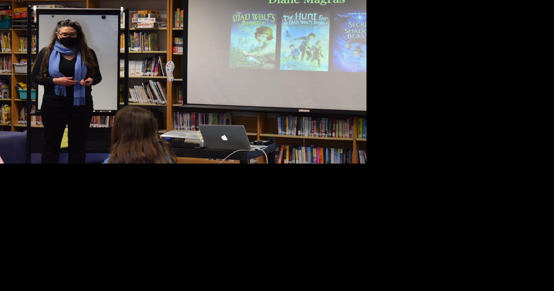 Award-winning author returns to Conners Emerson to talk with students ...