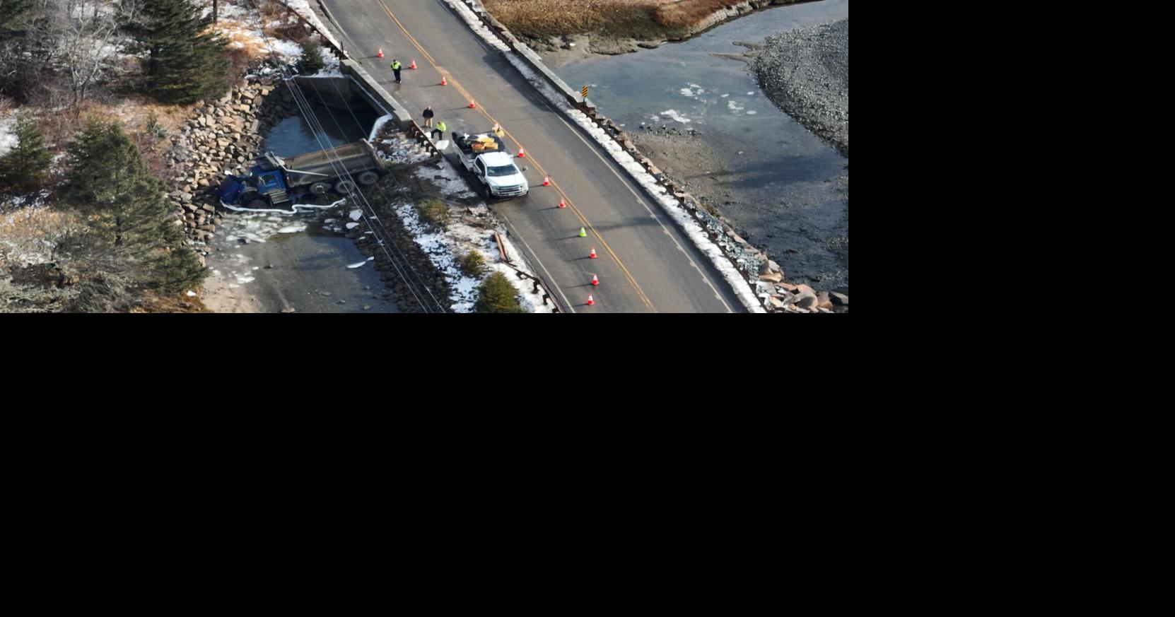 Black ice causes dump truck to slide off roadway | News | mdislander.com