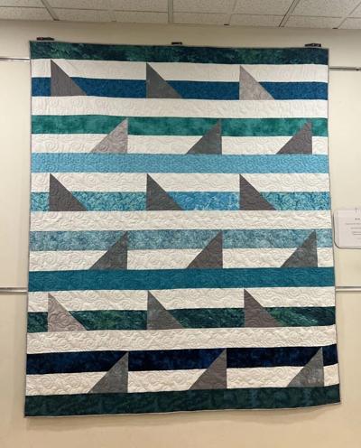 YMCA raffles off handmade quilt honoring Sharks swim community | News ...