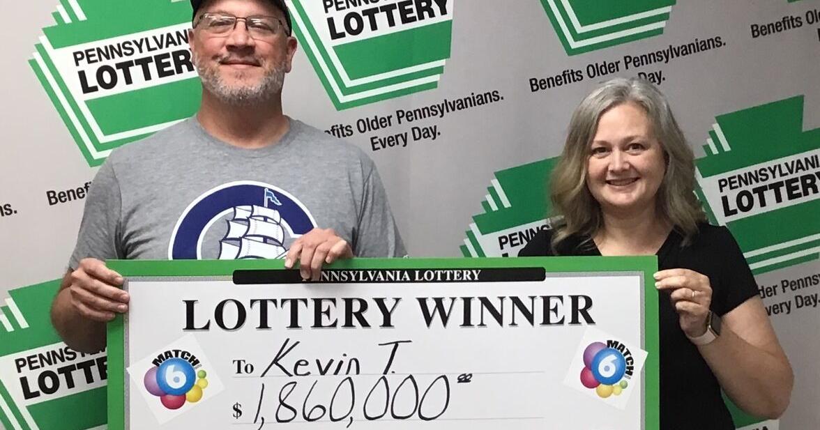 Lottery presents commemorative check to winner of $1.86 million jackpot ...