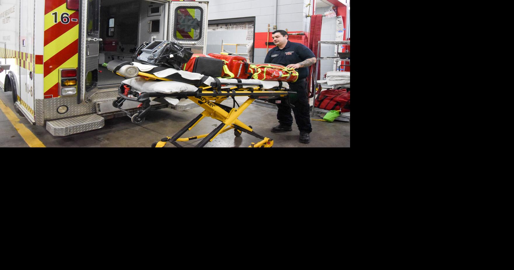 0331 mead fire ambulance - moving stretcher.jpg | | meadvilletribune.com