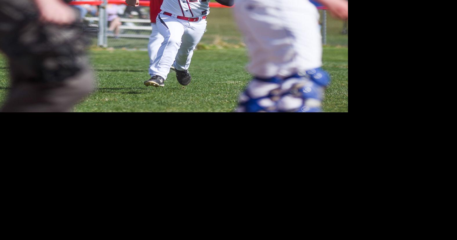H.S. BASEBALL: ’Dogs fend off Trojans in home opener | Sports ...