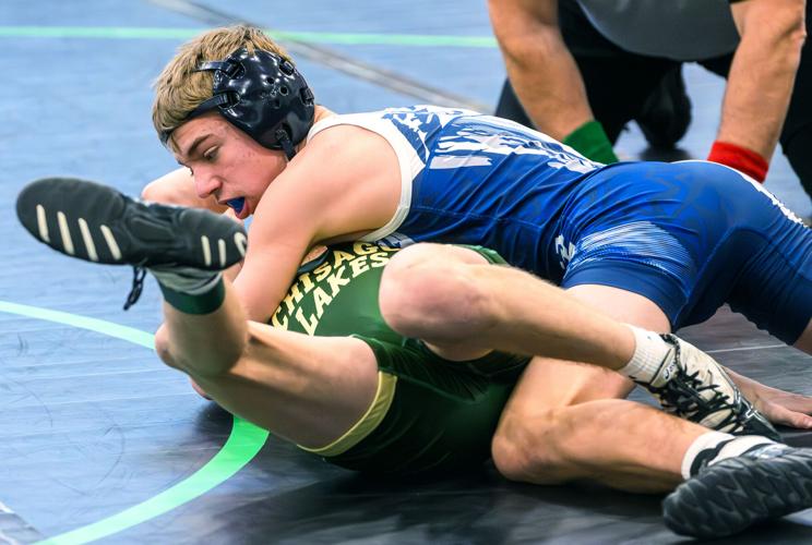 Wolverines win 4 titles at Benz Holiday Classic | Sports ...