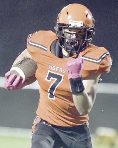 Early kickoff return sparks Tigers past Vikings | High School ...