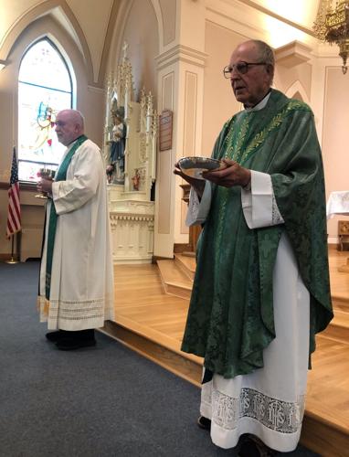 Father Boland, Father Flynn mark 55 years | News | mesabitribune.com