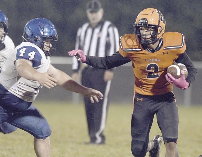Early kickoff return sparks Tigers past Vikings | High School ...