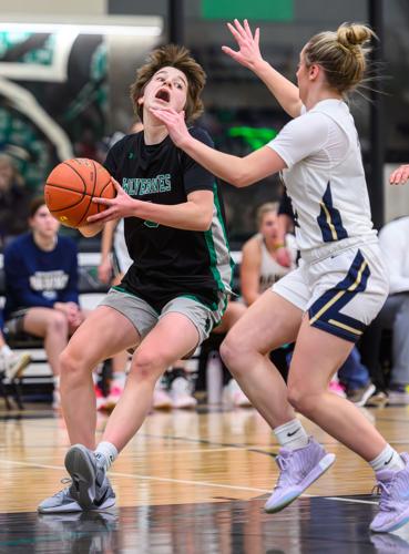 Lamppa passes 1,000 points as Wolverines cage Hawks | Sports ...