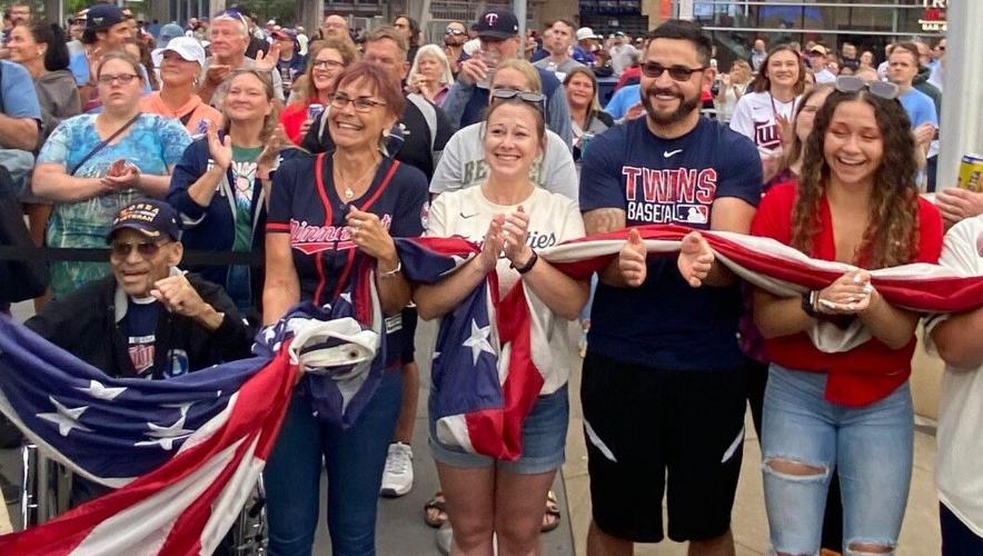 90-year-old vet Martin Hanson proud to raise flag at Twins game | Local ...