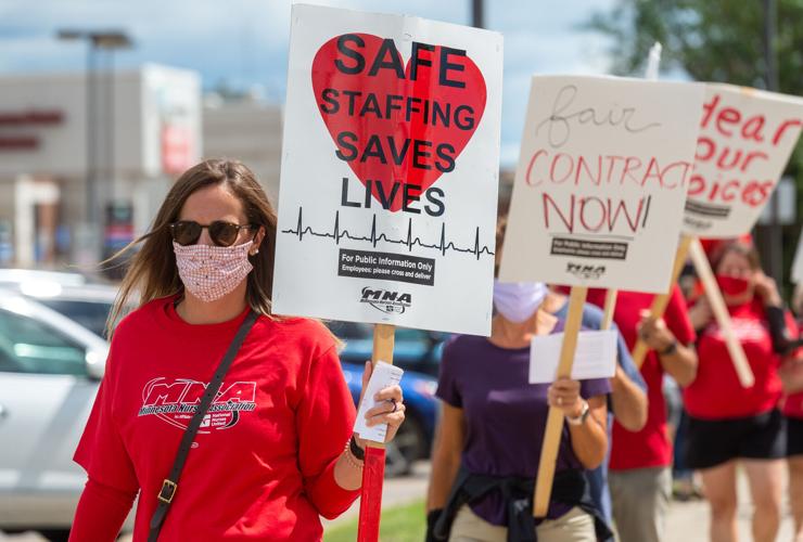 Nurses picket during off-work hours outside hospital | Local ...