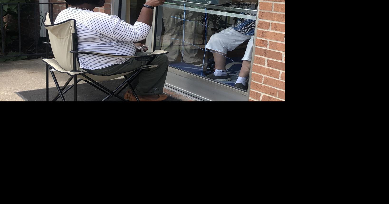 Health First staff play window tic-tac-toe with Riverside residents ...