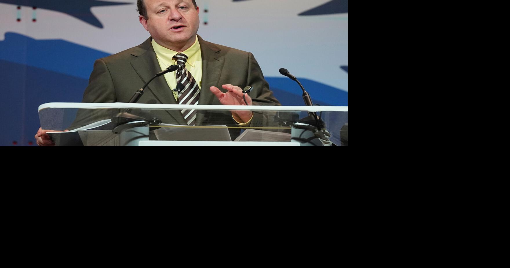 Colorado governor accuses Trump of playing 'political games' after ...