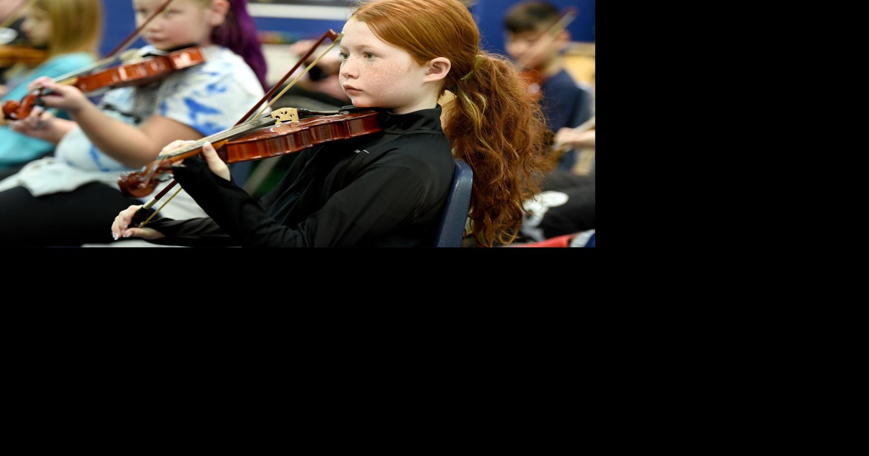Fiddlin' around: Lanham teaches students to play instrument | News ...