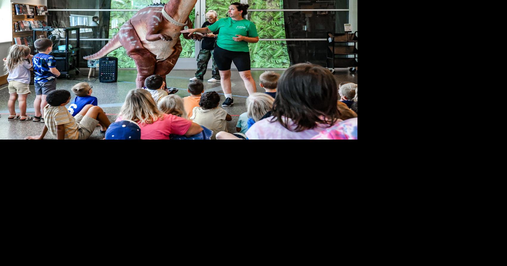 Pre-historic Encounter: Dinosaur program draws large crowd to library ...