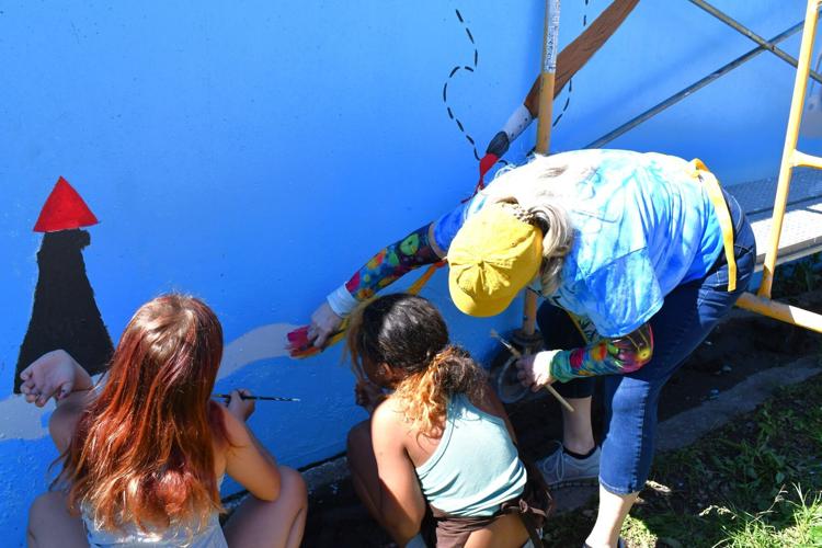 ‘They’re learning the process of how artwork becomes a mural ...