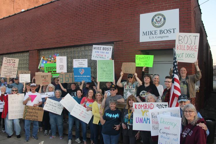 Bost hosts rescheduled telephone town hall; dozens protest in ...