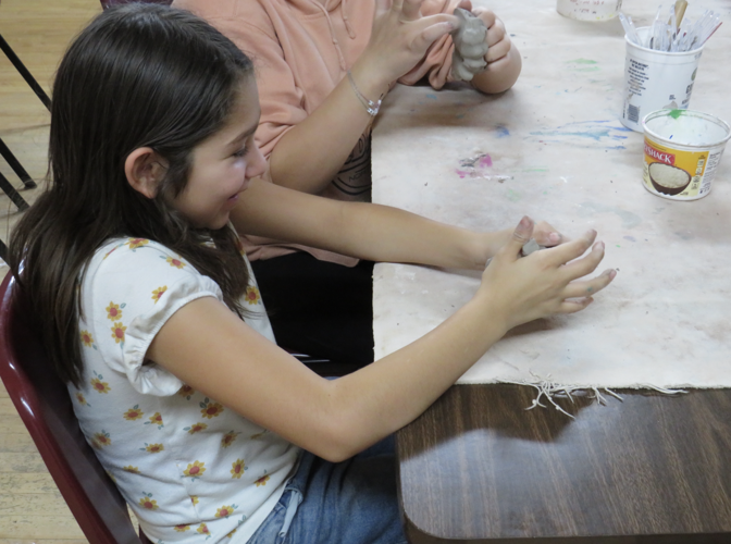 Learning to shape clay | | milescitystar.com