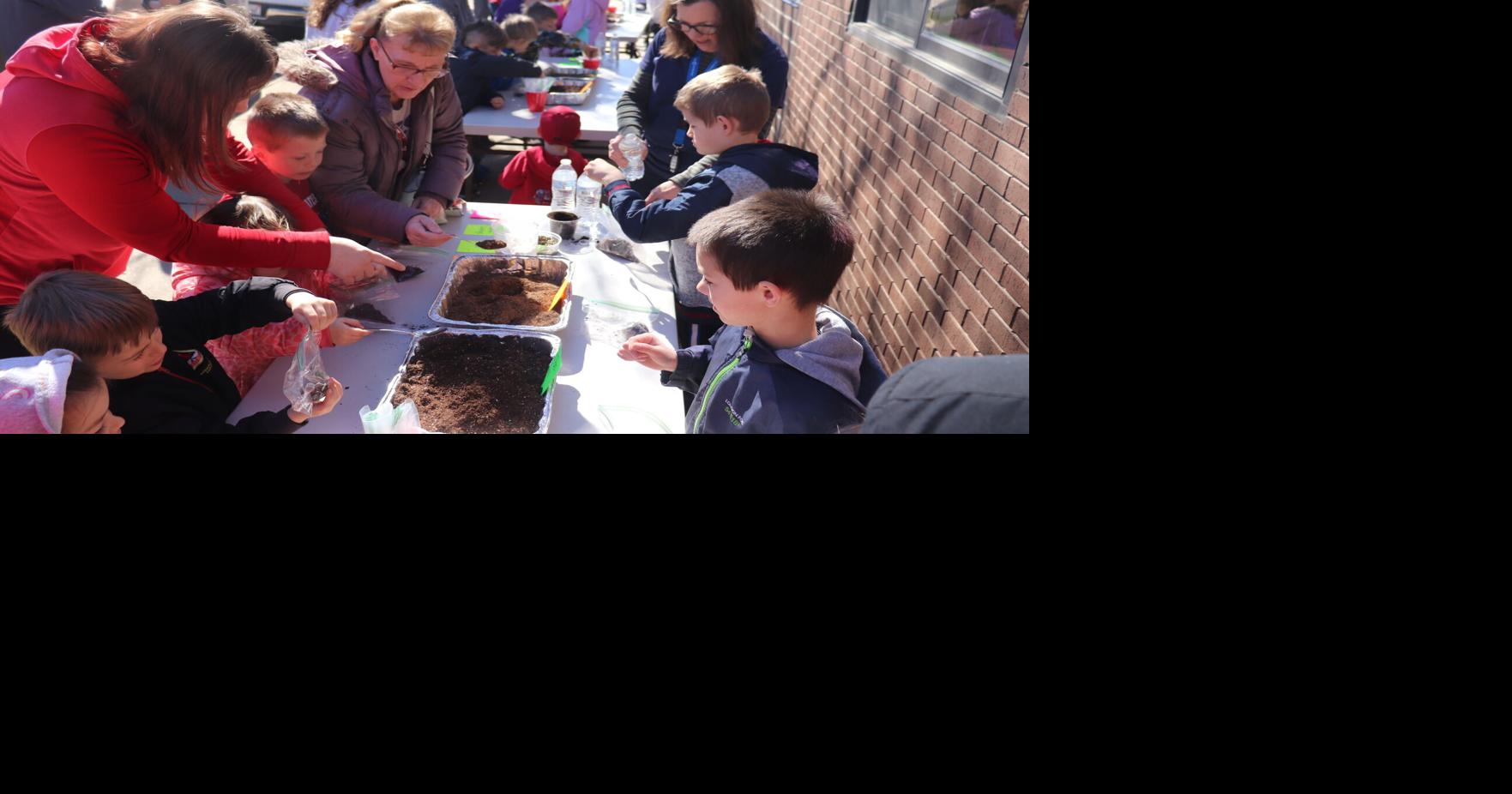 Children lean how to make pollinator seed bombs | Local | milescitystar.com