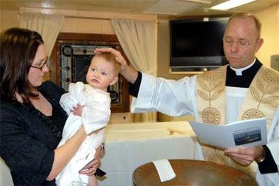 Chaplain conducts traditional Baptism aboard USS Wasp | Heroes At Home ...