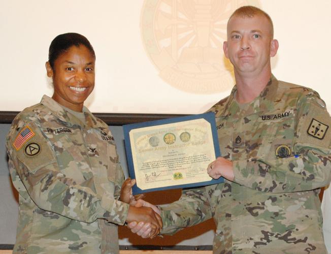 24 pin instructor badges at QM School ceremony | Local News ...