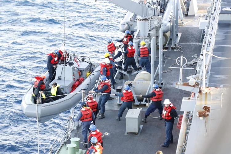 USS Curtis Wilbur (DDG 54) rescues two men at sea | Quarterdeck ...