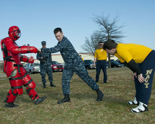 Sailors train to repel an attacker when sprayed with OC day spray | Top ...