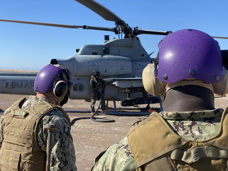 Sailors from NCHB1 refuel Marine Light Attack Helicopter Squadron (HMLA ...