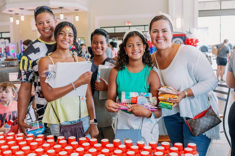 Operation Homefront distributes backpacks, supplies to ready hundreds ...