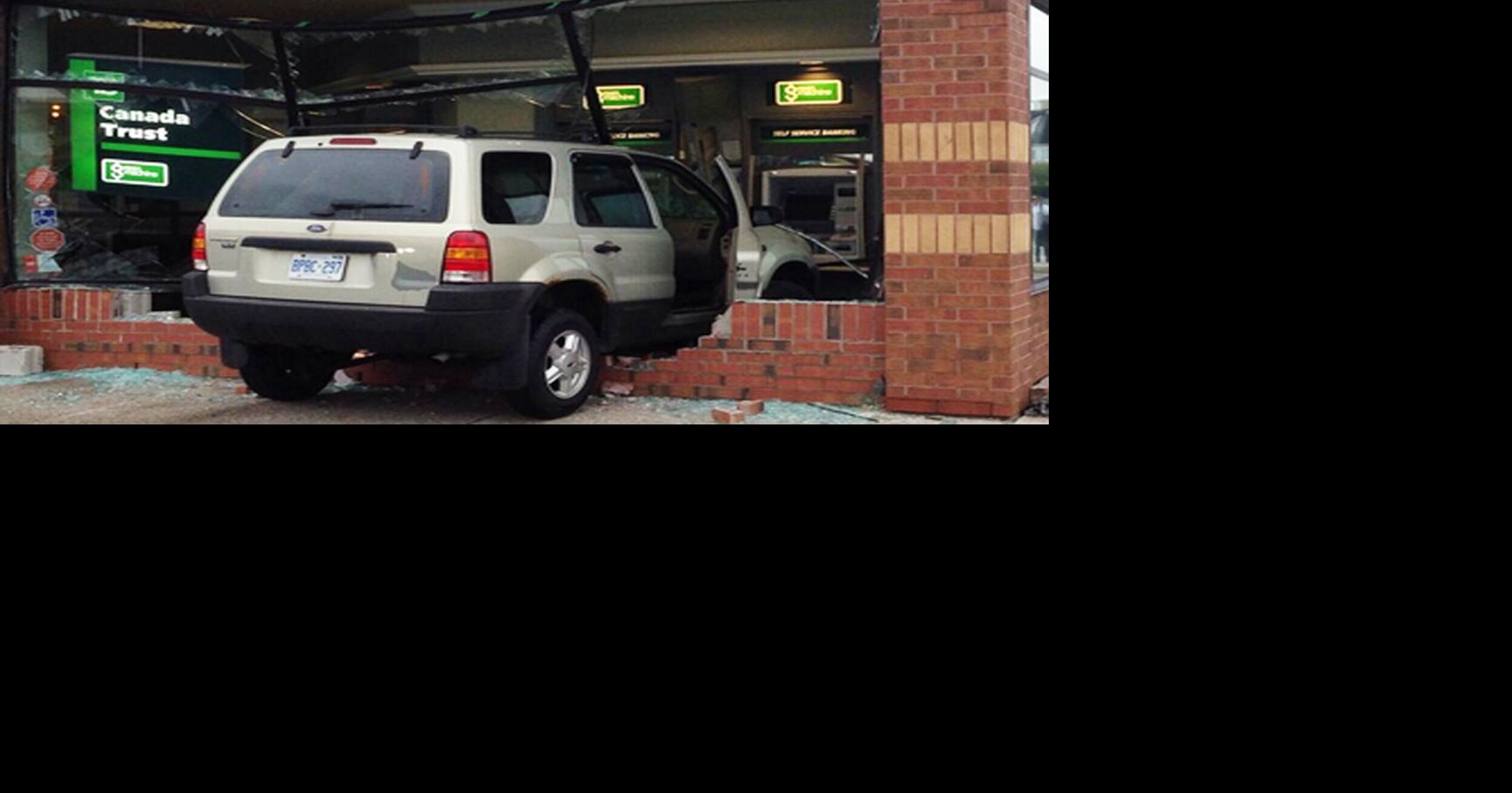 Updated: Customer injured as SUV drives into bank