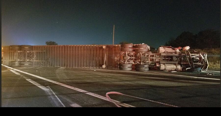 No spill of corrosive cargo after transport truck flips on Hwy. 401: OPP