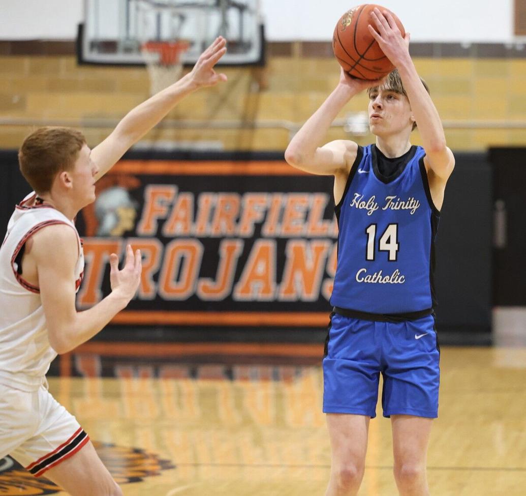 Holy Trinity basketball: Crusaders split with West Burlington | Daily ...