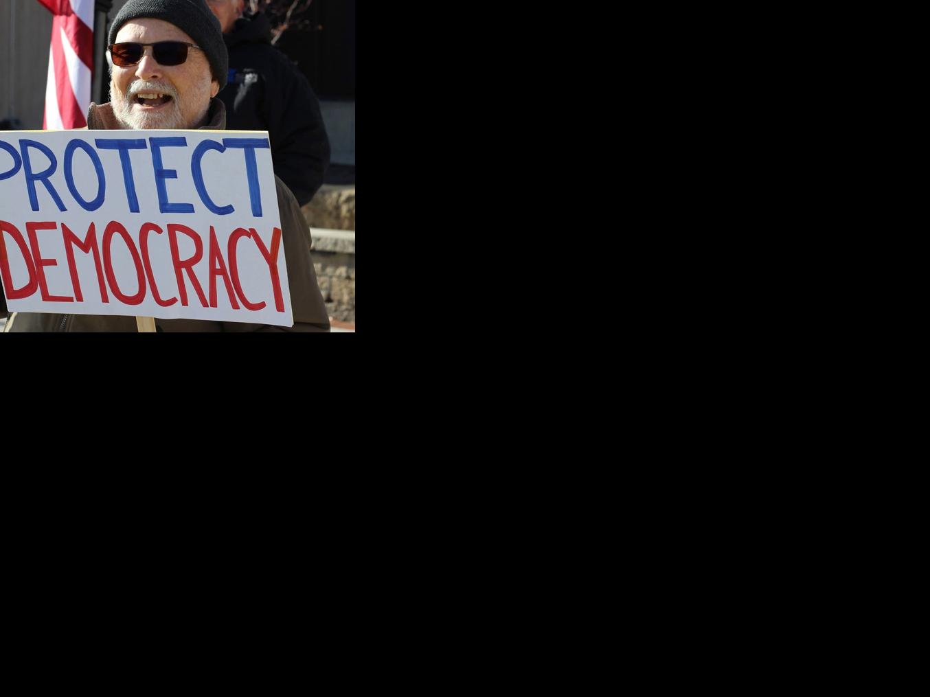 Local demonstrators protest Minneapolis ICE shooting | The Hawk Eye ...