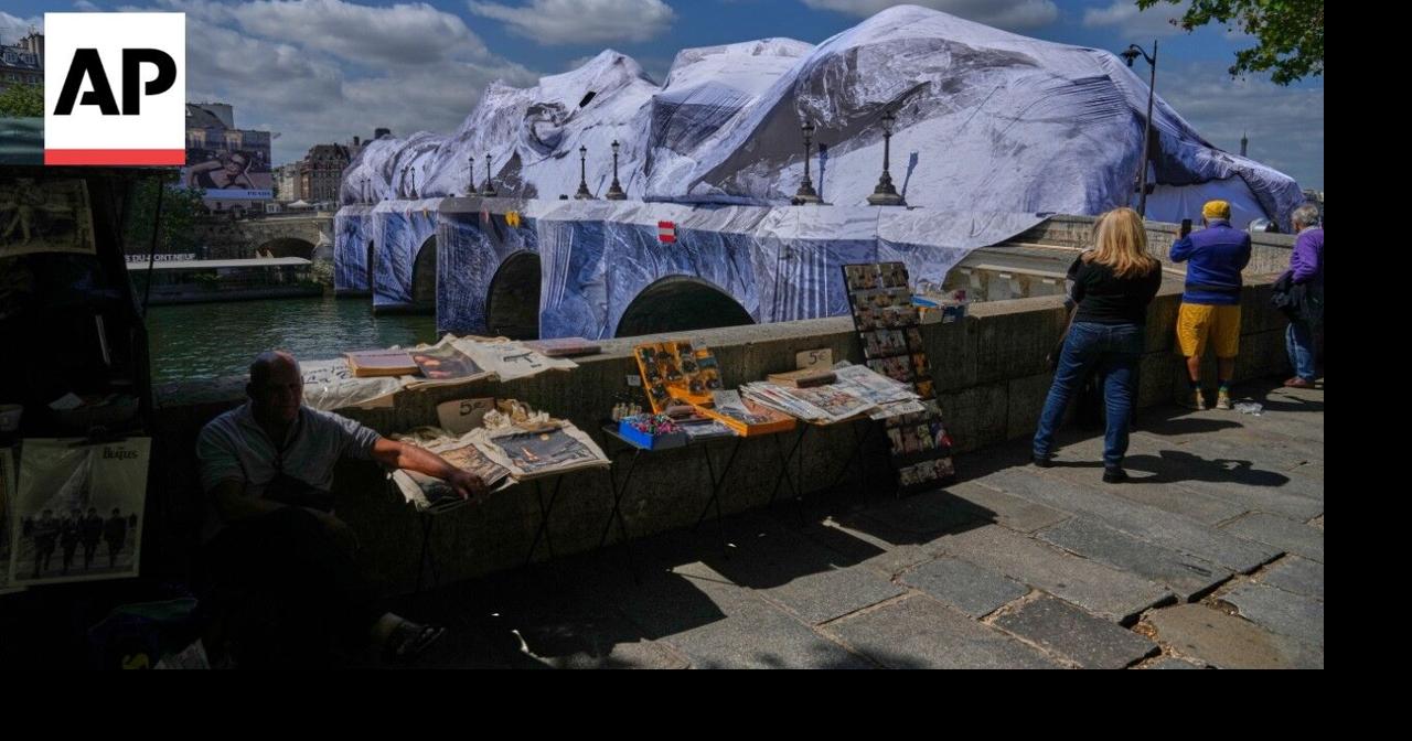 French artist JR inflates a giant ‘cave’ over Paris’ oldest bridge ...