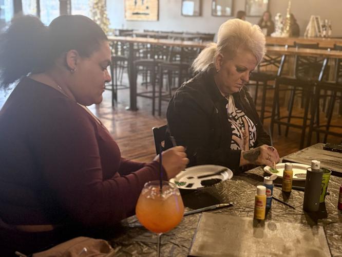 The swirl of wine and swish of brushes combine for low key holiday ...